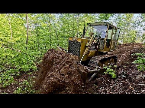 Bulldozer TG 75 u sumi - YouTube