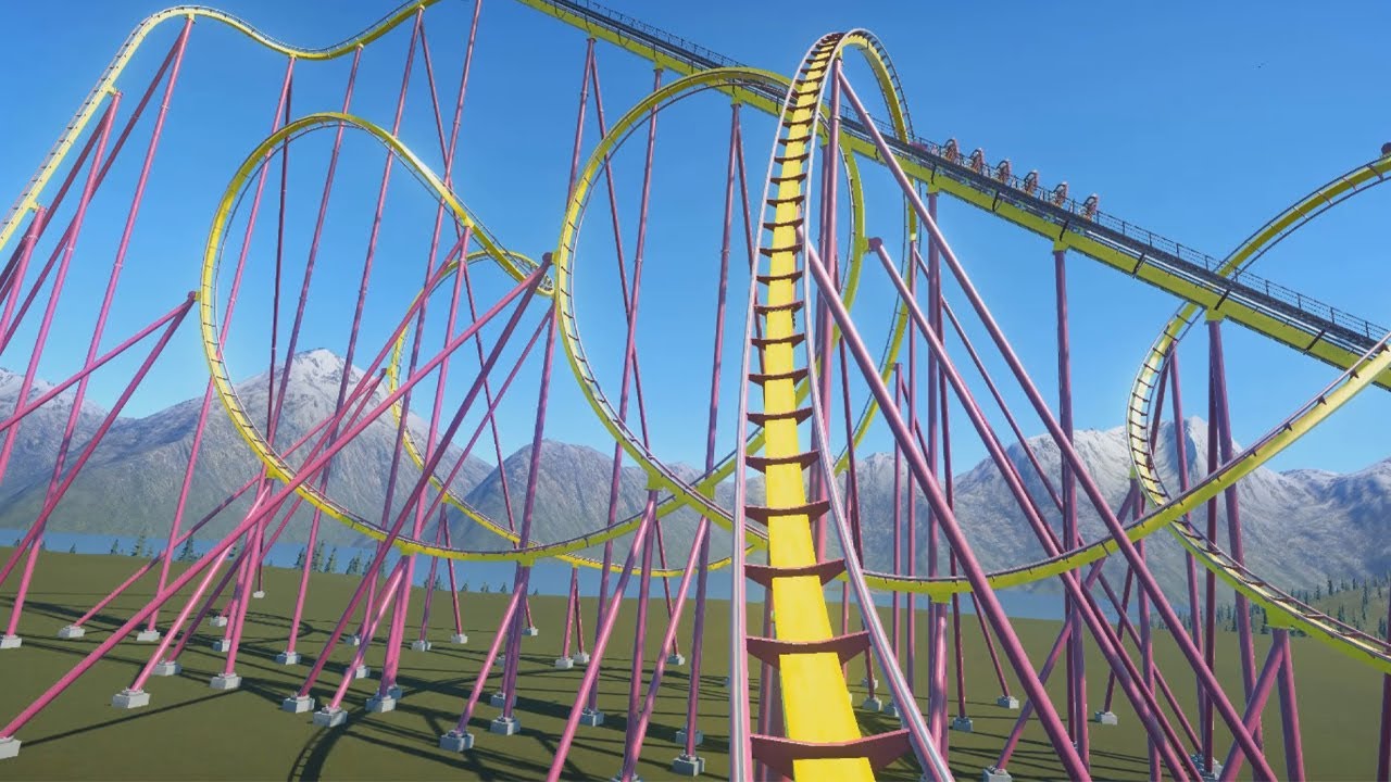 Roller coaster with fast acceleration and a beautiful lake in the ...