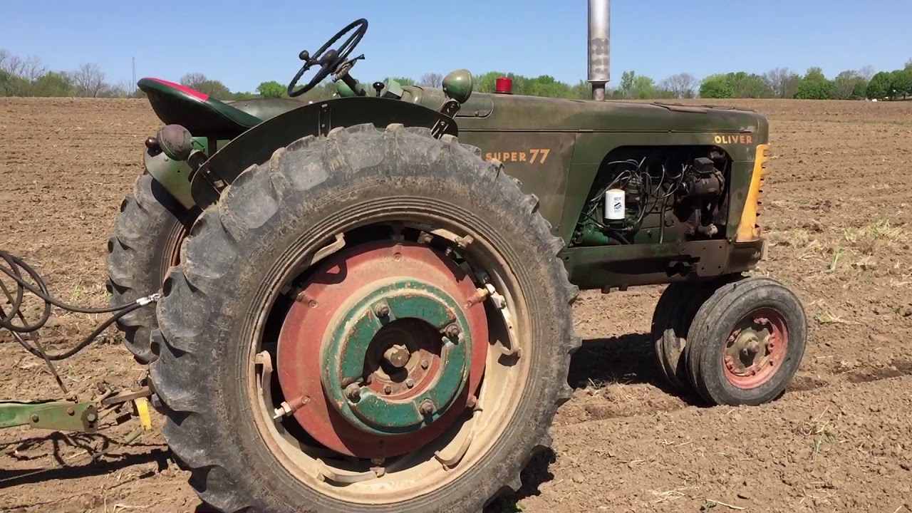 Corn planting with Oliver and John Deere Equipment - YouTube