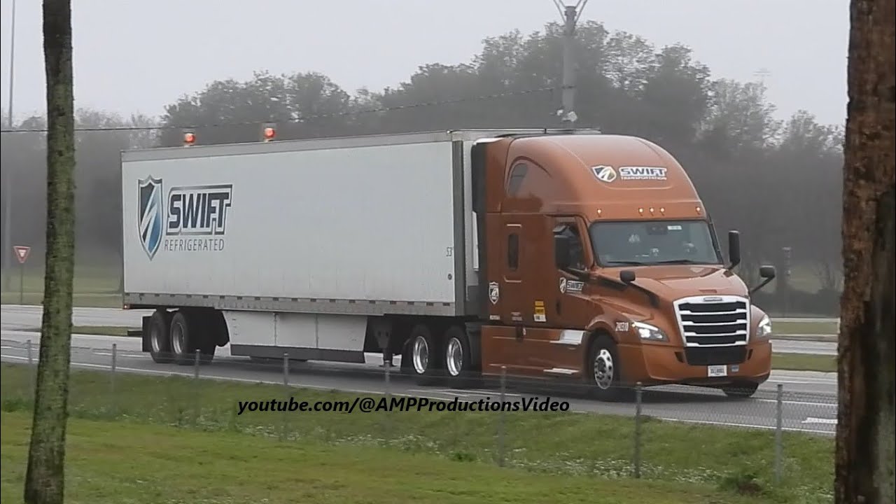Truckspotting Orange Freightliner Cascadia Swift 112124 - YouTube