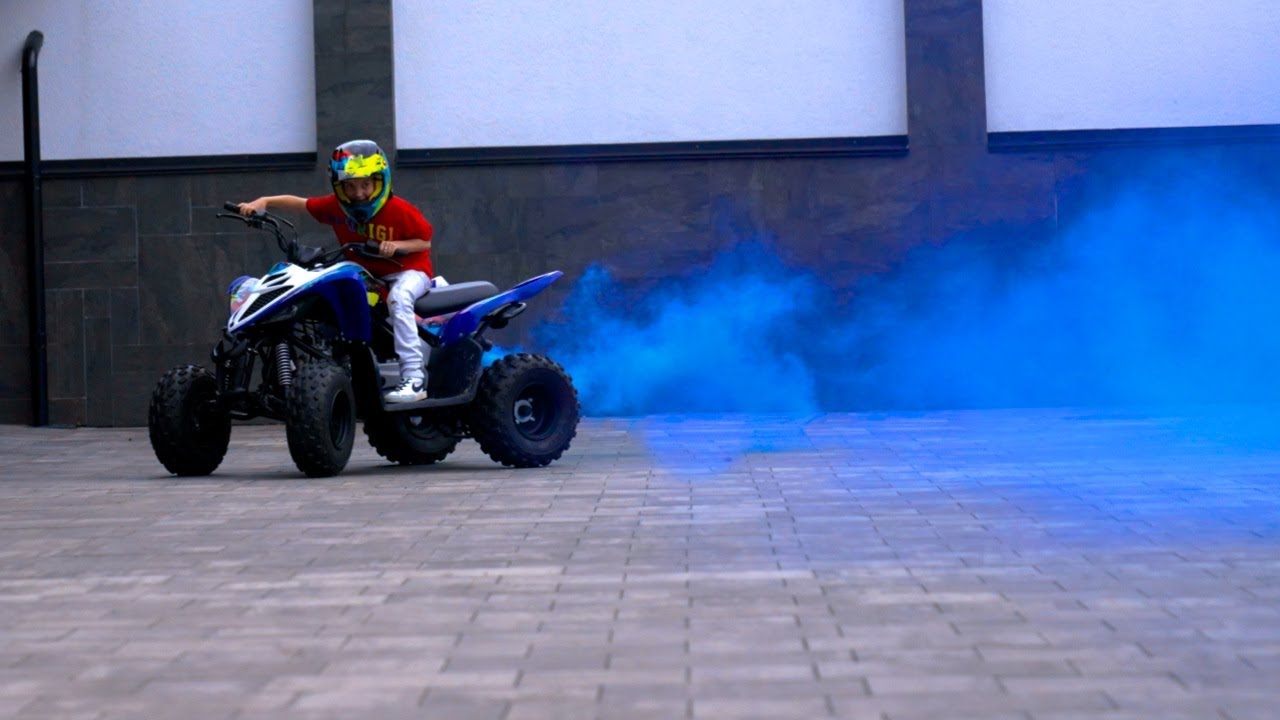 Boy Riding An ATV With Blue Smoke - YouTube