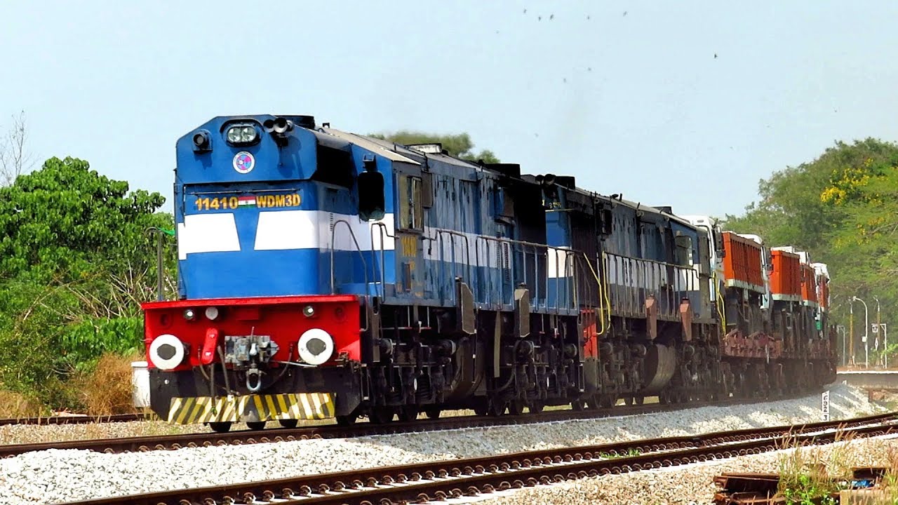 Twin WDM3D's in full fury thunder past Udupi with RORO freight train ...