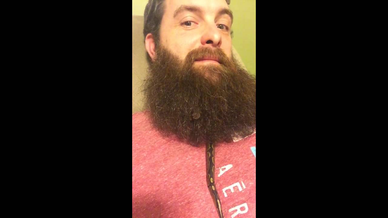 Snake Slithers through Man's Beard - YouTube