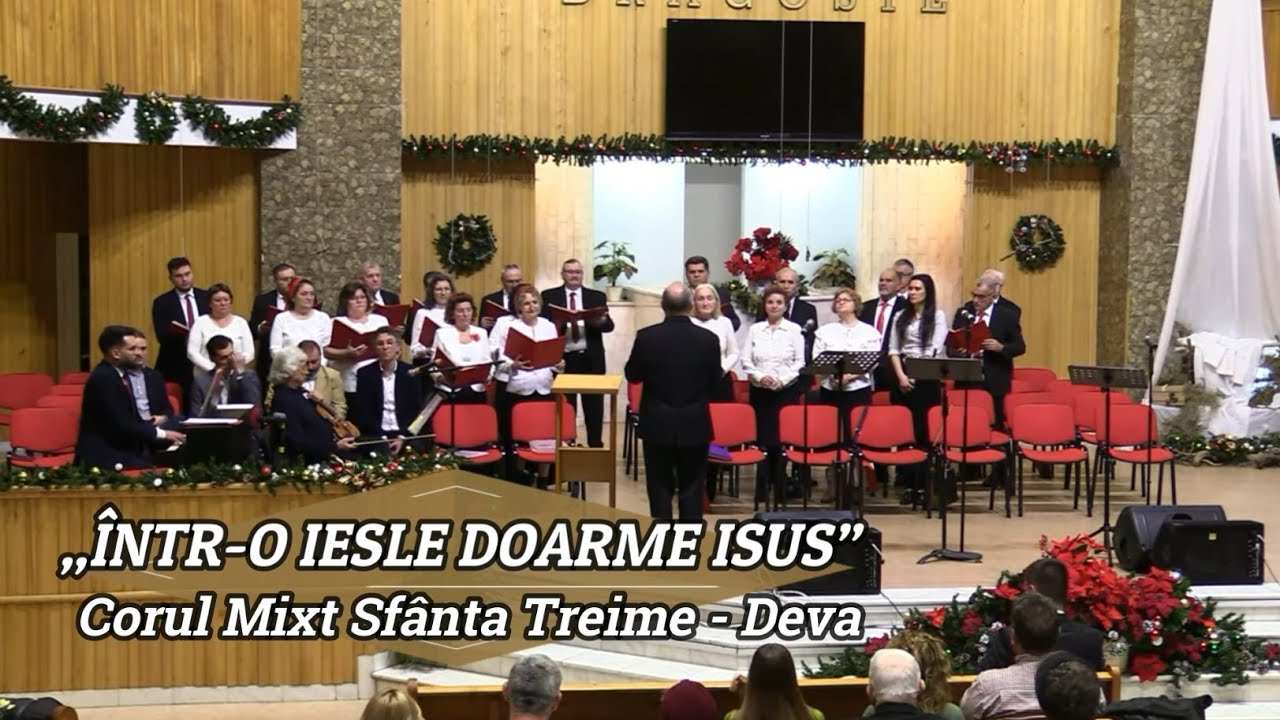 „ÎNTR-O IESLE DOARME ISUS” - CORUL MIXT SFÂNTA TREIME DEVA - YouTube