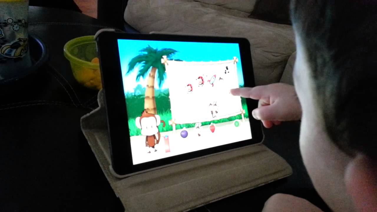 Logan playing the Monkey Preschool Lunchbox app. - YouTube