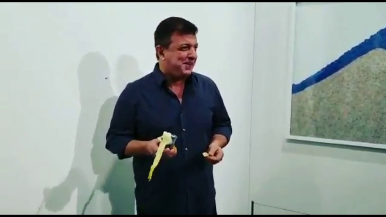 David Datuna: Artist eats $120,000 banana art at gallery! - YouTube