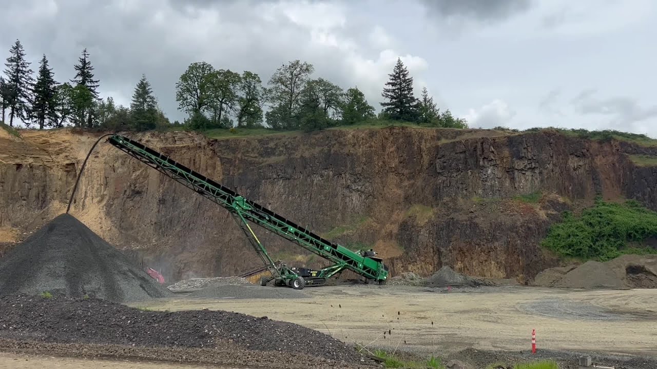 Crushing volcanic rocks at the quarry - YouTube