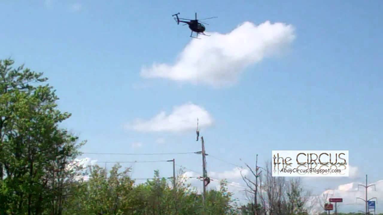 Lineman Works From Helicopter - YouTube