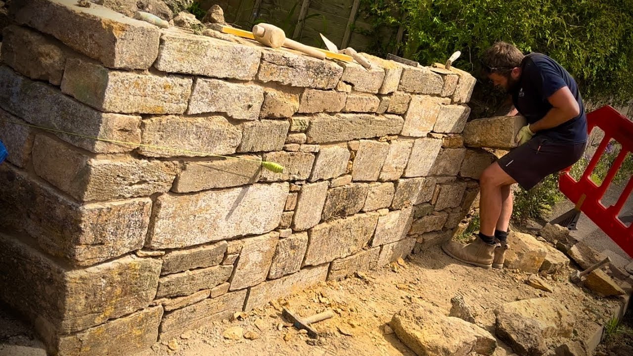Rebuilding a wall with BIG STONES! - YouTube