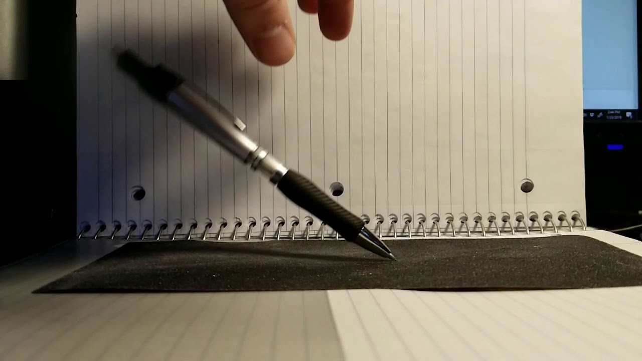 Demonstration of Friction on a Falling Pen - YouTube