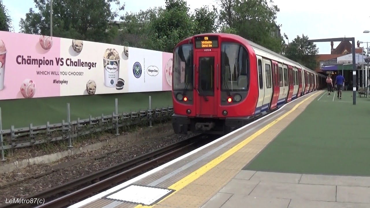 London Underground S7 Stock no. 21376 departs at Southfields - YouTube