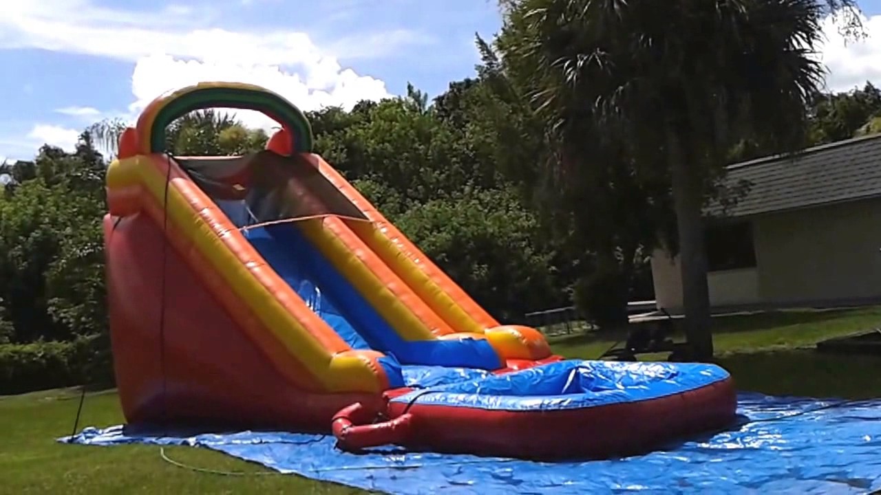 Deliver and setup four 18 feet tall water slides - YouTube