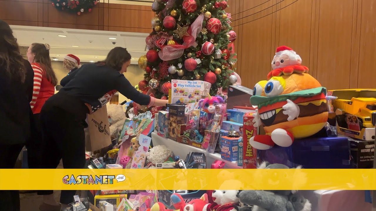 Tiny Tim Toy Drive fills Coast Capri Hotel with presents - YouTube