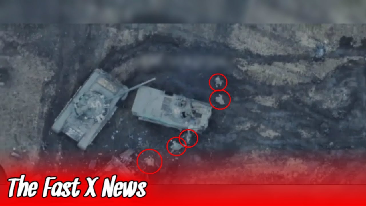 Ukrainian troops take aim, visible are four armored battle tanks of ...