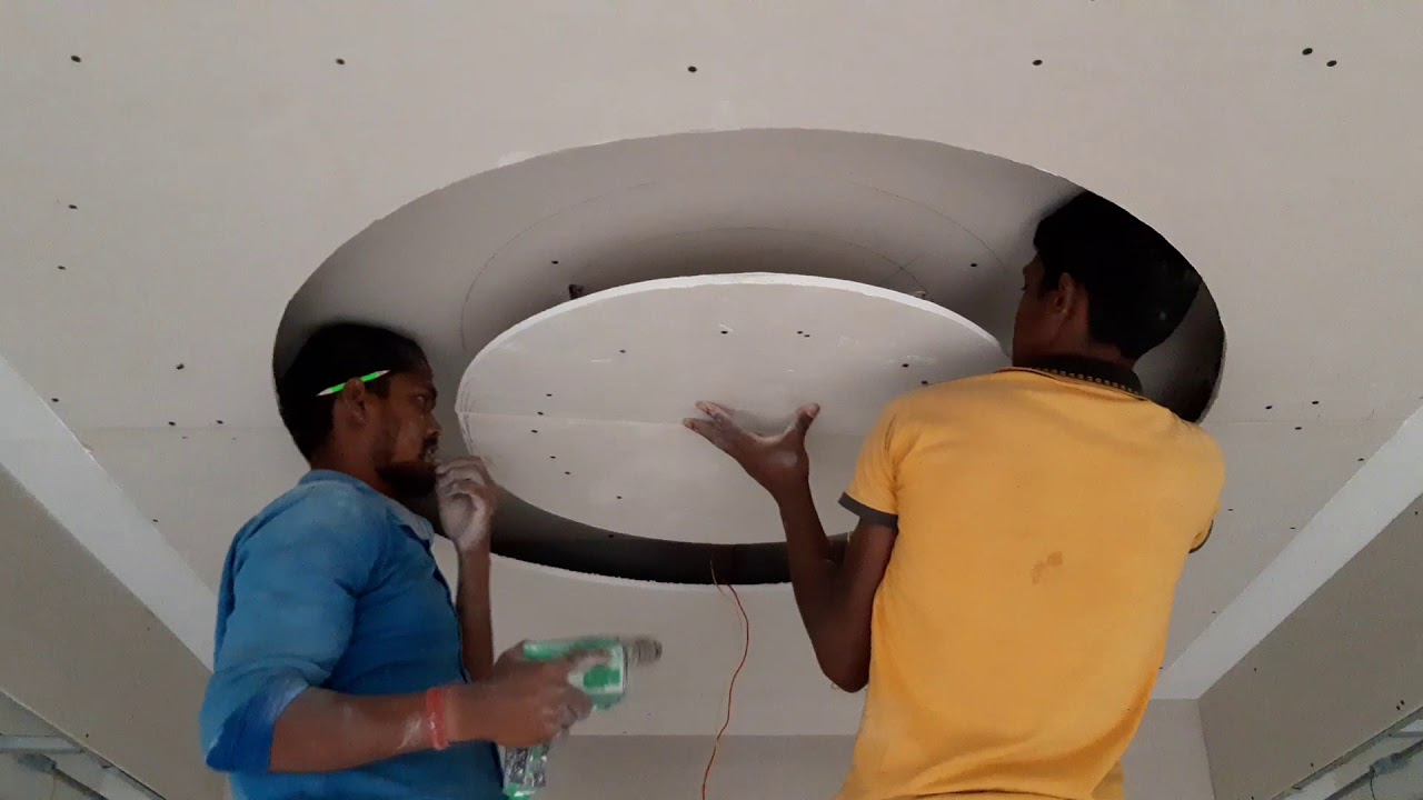 False ceiling , circular design with tray light, made of gypsum board ...