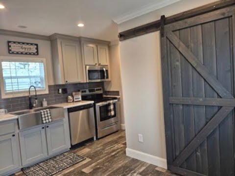 Rustic meets coastal in this new manufactured home for sale at River Palms 55+ waterfront ...