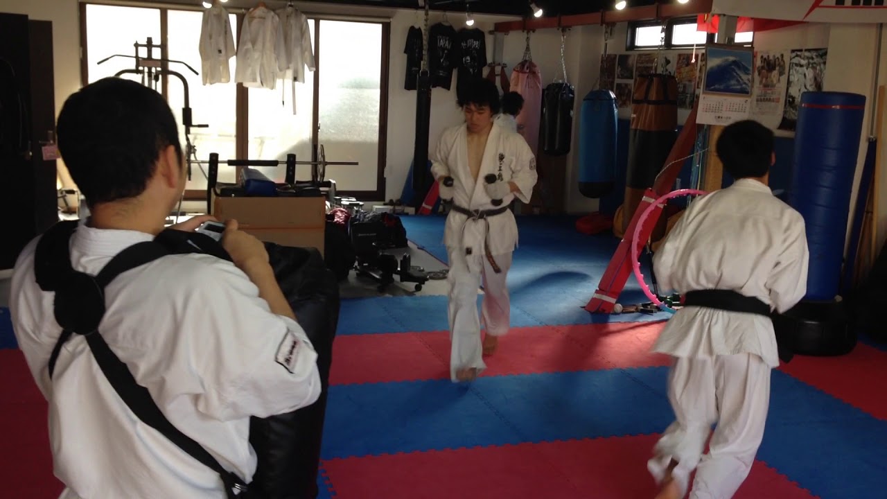 Punch and kick circuit training with a have weight at running - YouTube