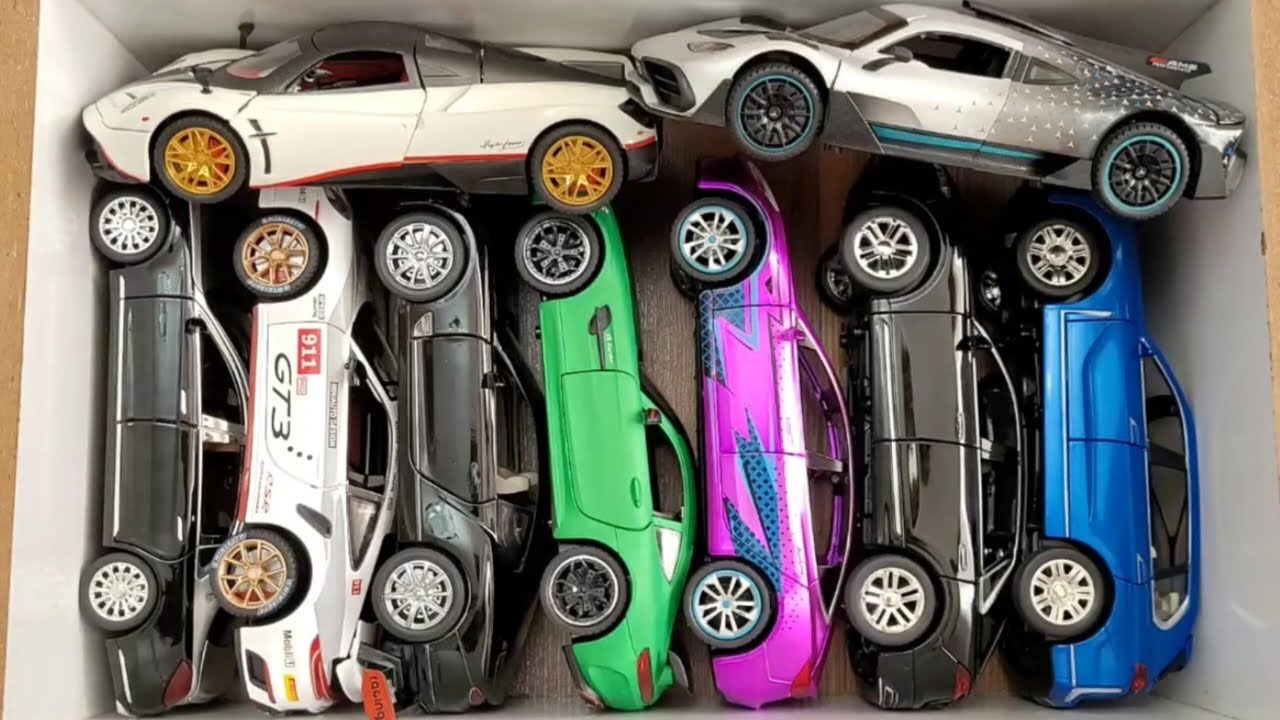 Box full off model cars,Mercedes AMGOne,tesla,Maybach s600,Porsche Gt ...