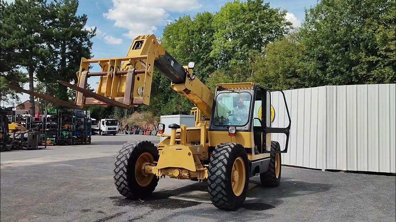 Telescopique Caterpillar TH82 - YouTube