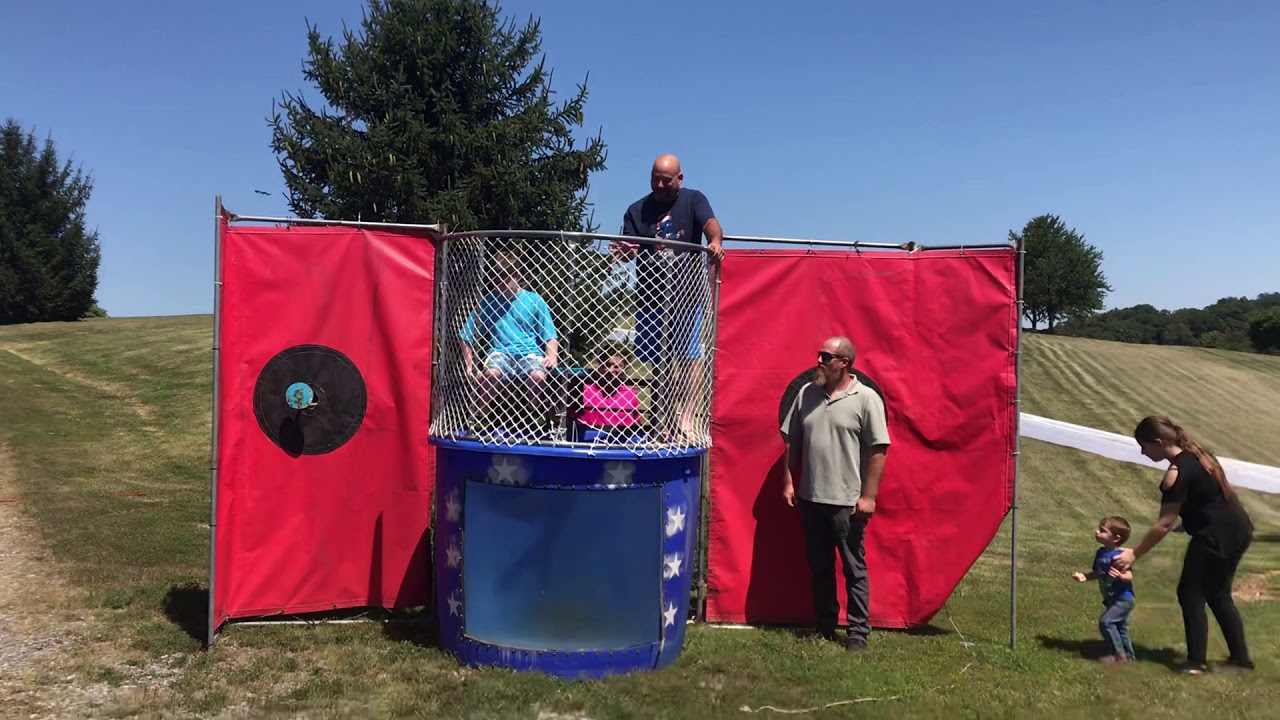 Dunking tank baptism! - YouTube
