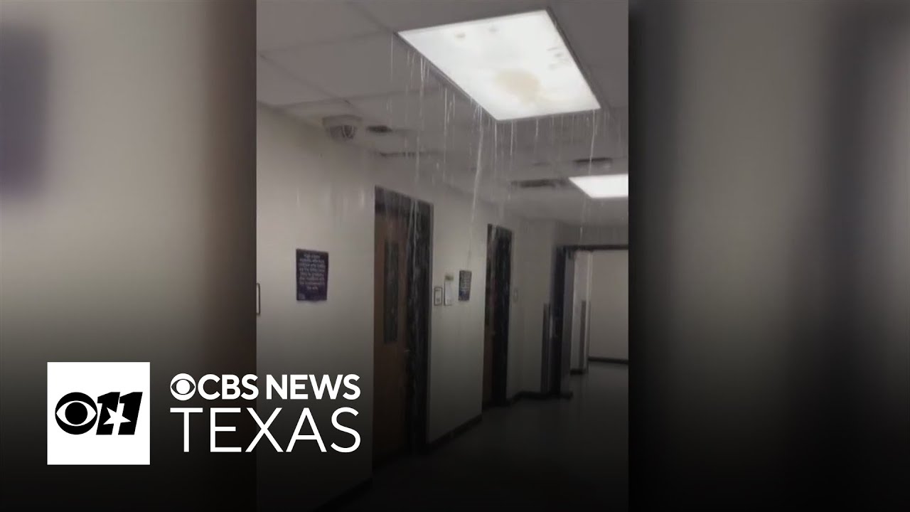 Severe weather brings flooding inside Irving High School - YouTube
