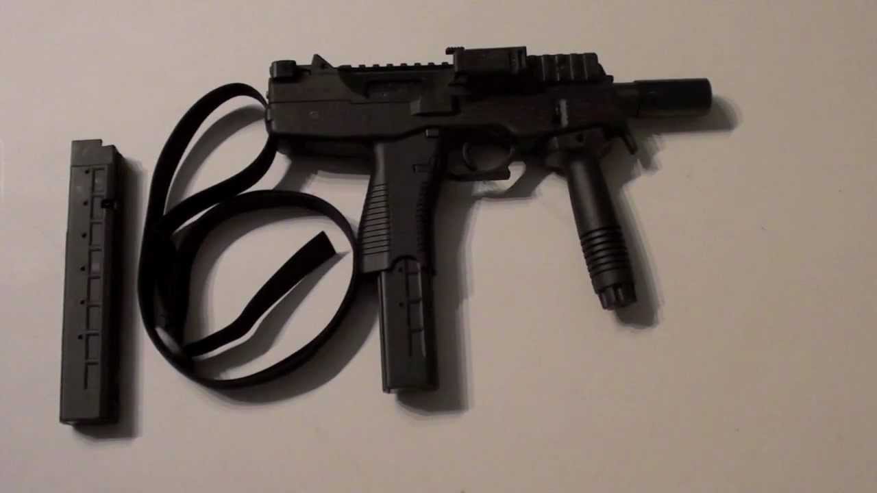 Steyr SPP 9x19mm shooting 30 rounds magazine with front grip and red ...