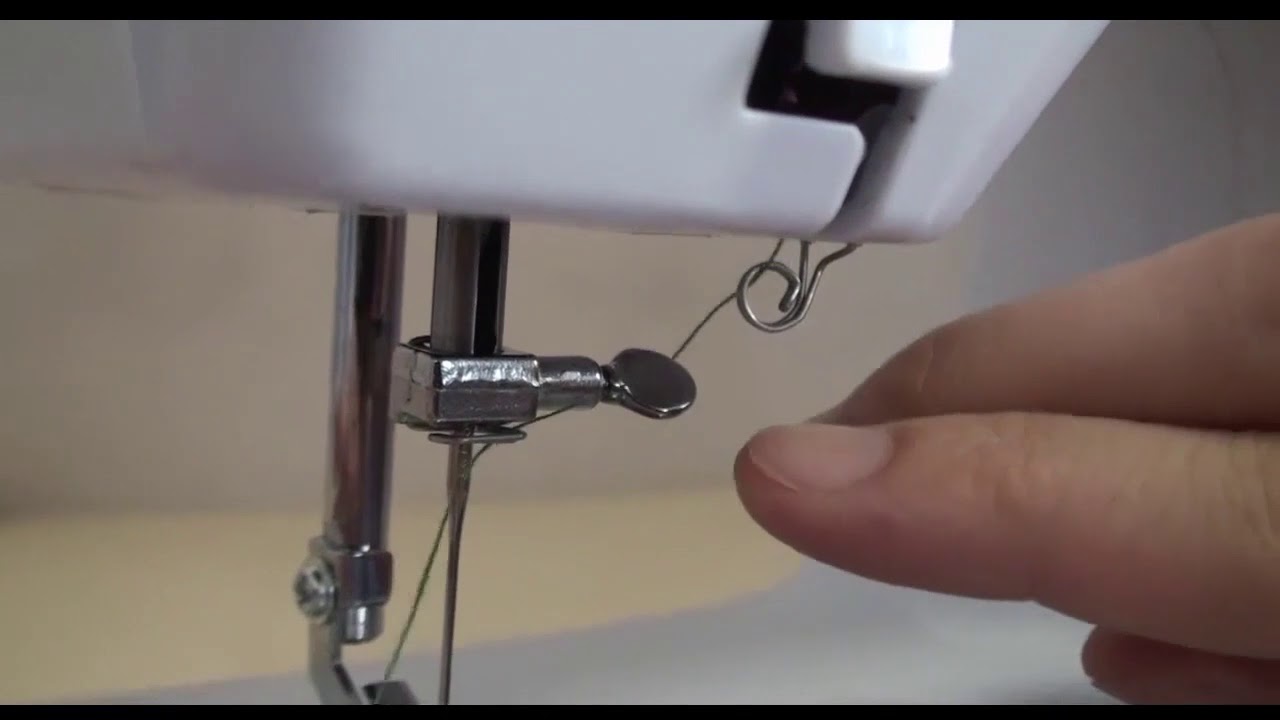 ETF1527 - MACHINE A COUDRE TRIOMPH - YouTube