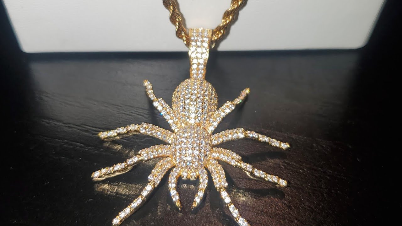 golden pyramid spider with rope chain vs diamond tester - YouTube