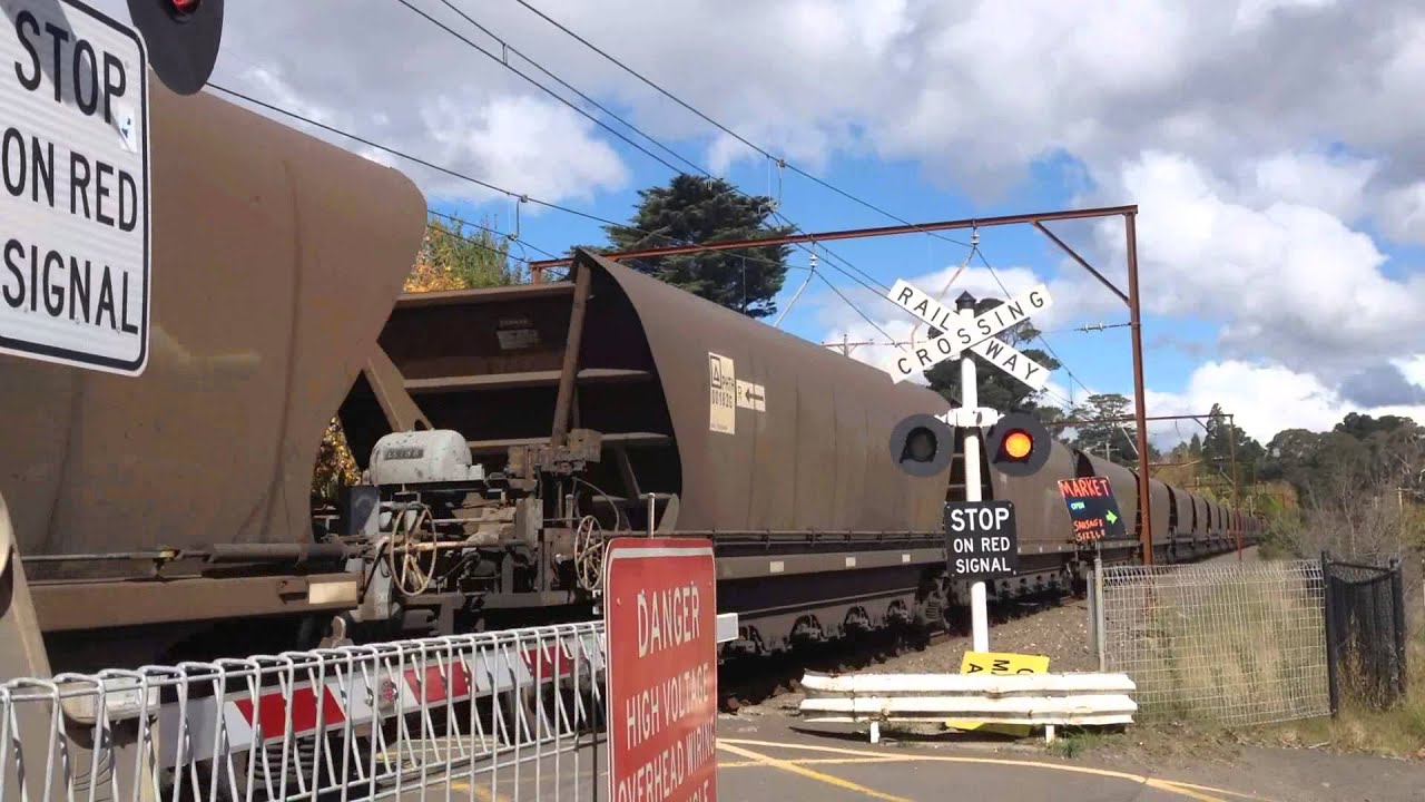 a fright train passing level crossing at Blackheath Blue Mountains NSW ...