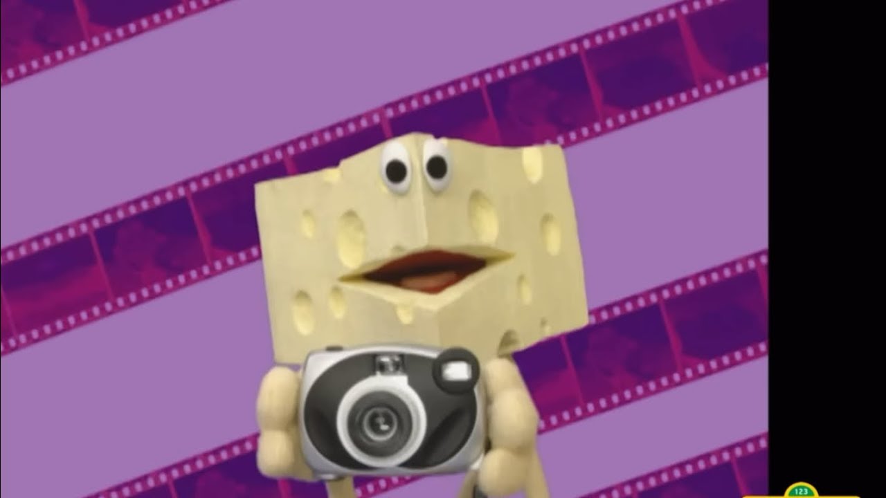 Elmo tries to take a picture of cheese - YouTube