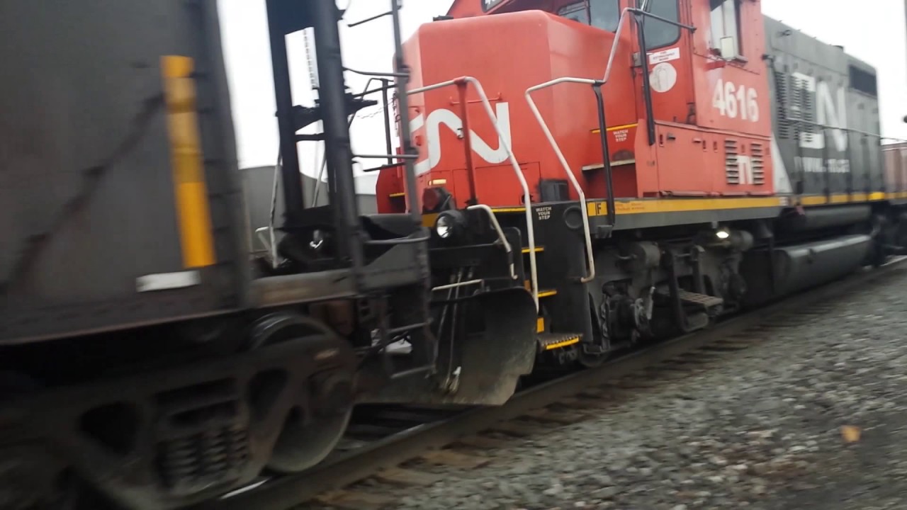 CN (Ex-GTW #1780 GP9) Rebuilt to GP9R #4616 leads coke train Northbound ...