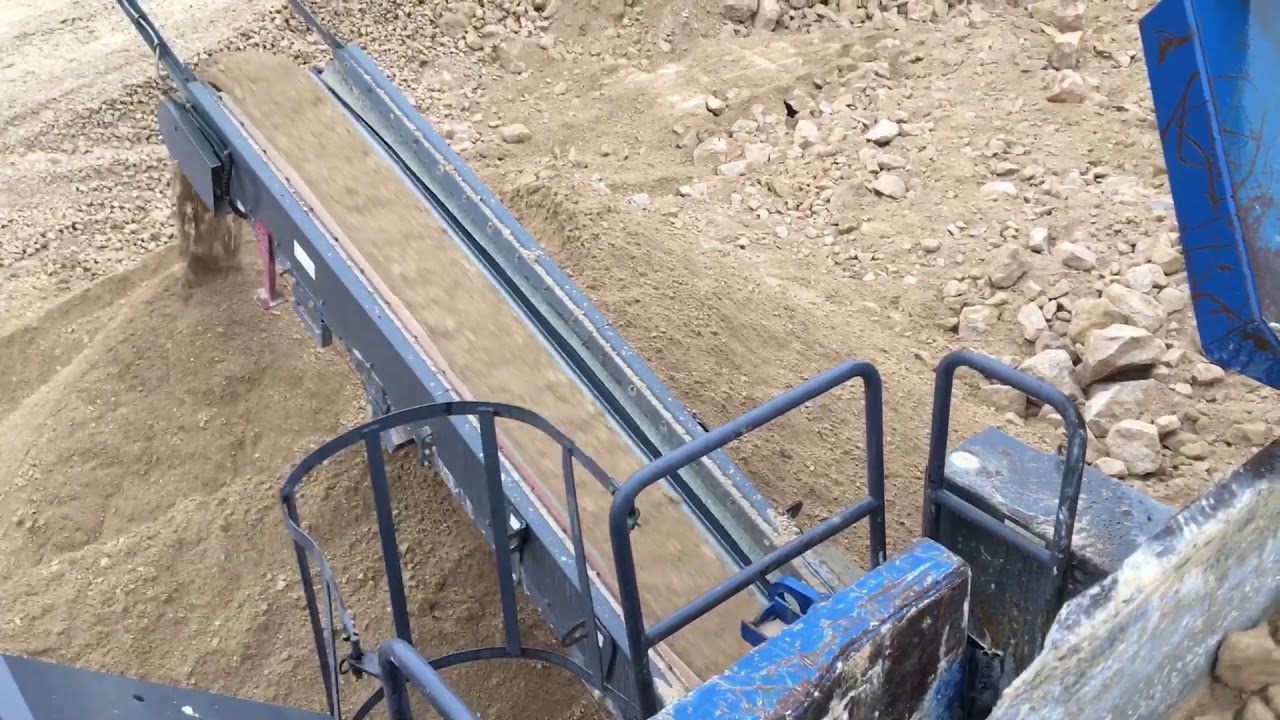 Quarry crusher crushing limestone - YouTube