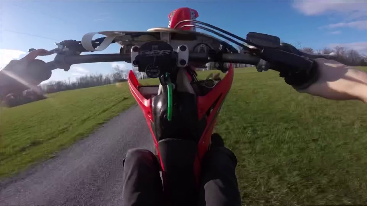 One handed wheelies and jumping the road // CRF250R - YouTube