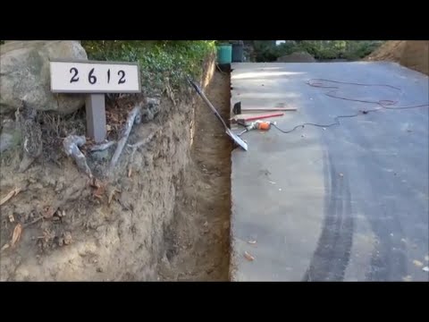 Phase 2, Digging the retaining wall Trench - YouTube