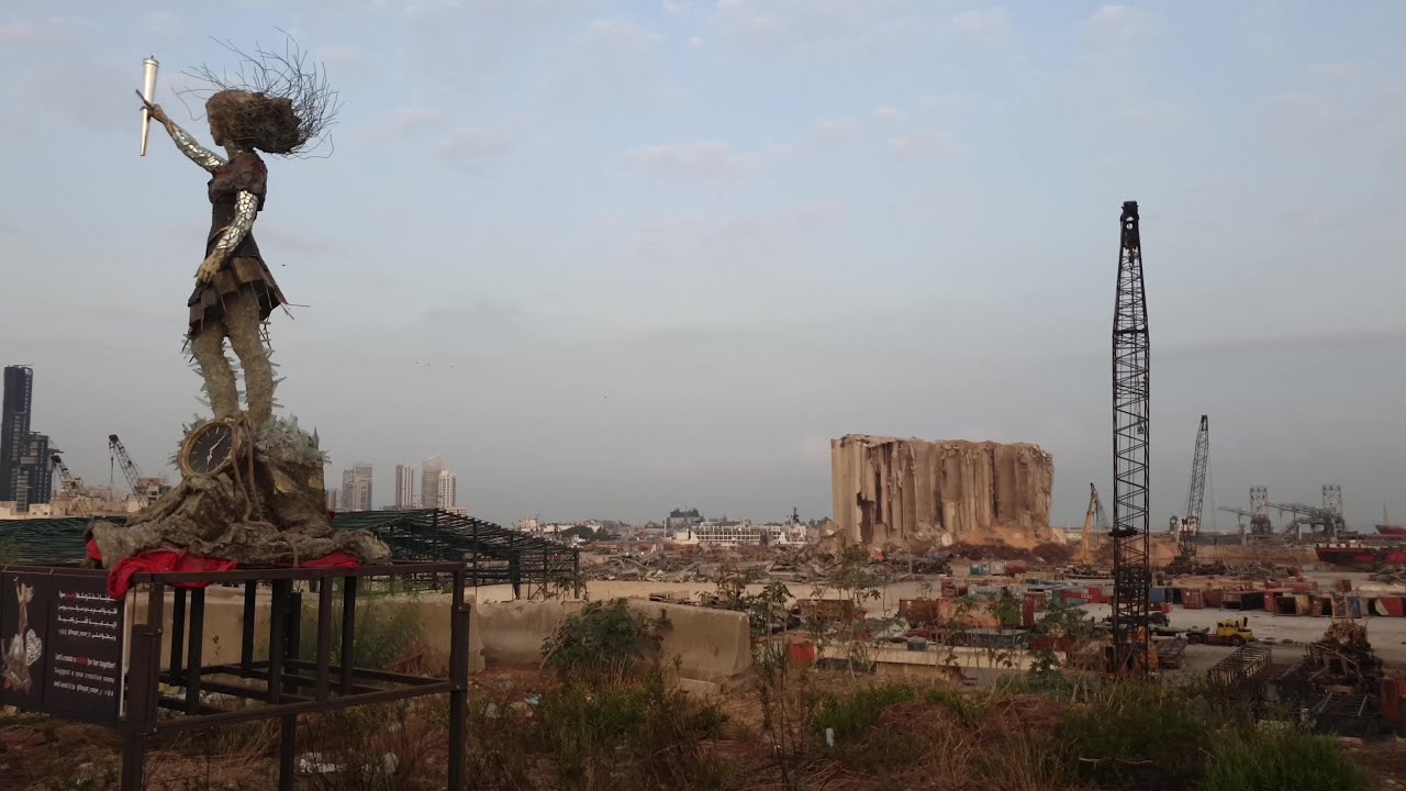 Statue made out of Beirut blast rubble stands opposite port | AFP - YouTube