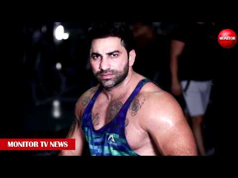 Kamil Zeynallı polislərin gözü qarşısında dava etdi