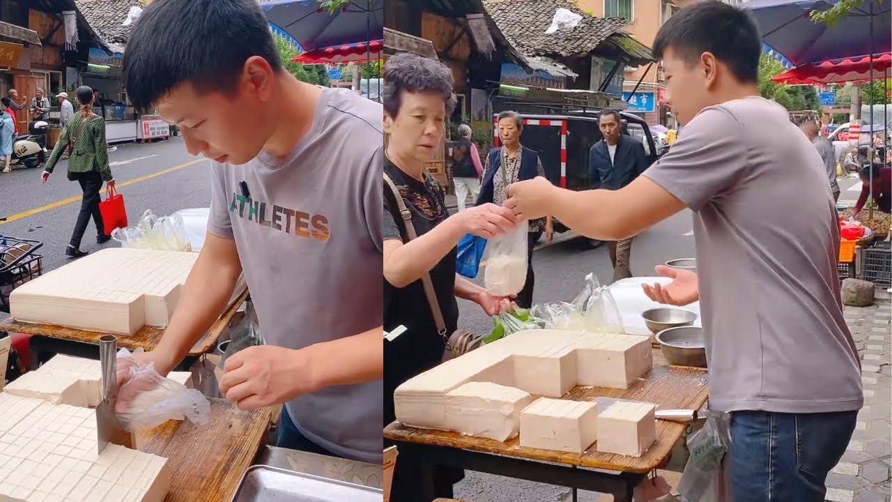 The stall sells tofu, which is freshly made and sold on September 23nd ...