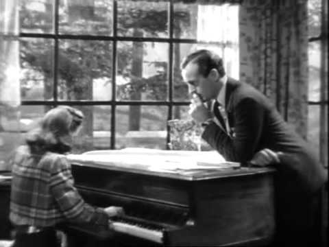 Barbara Stanwyck plays piano in The Other Love, 1947