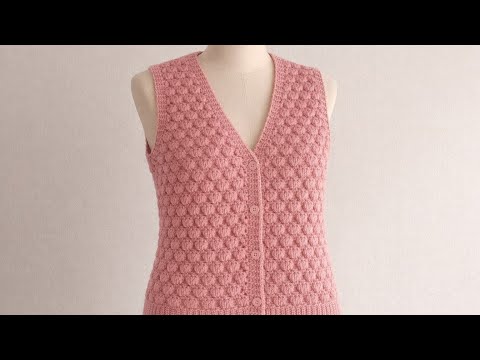 Bu model gerçekten zarif ve şık bir örnek — ajurlu ve tığ işi bir dokuya sahip. Yelek yapmak için