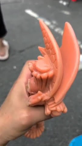 Sunstone Flying Dragon with Spread Wings Sitting on a Pillar of Skulls ...