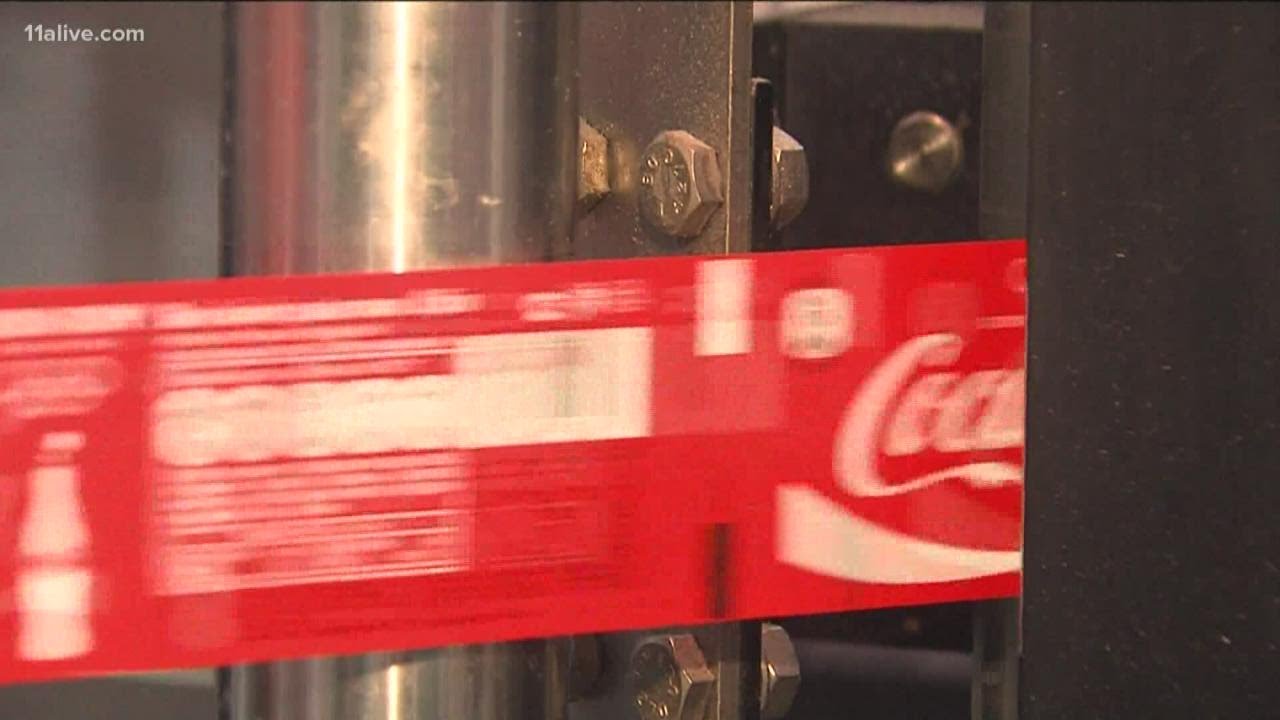 Coca-Cola Company cutting back on jobs - YouTube