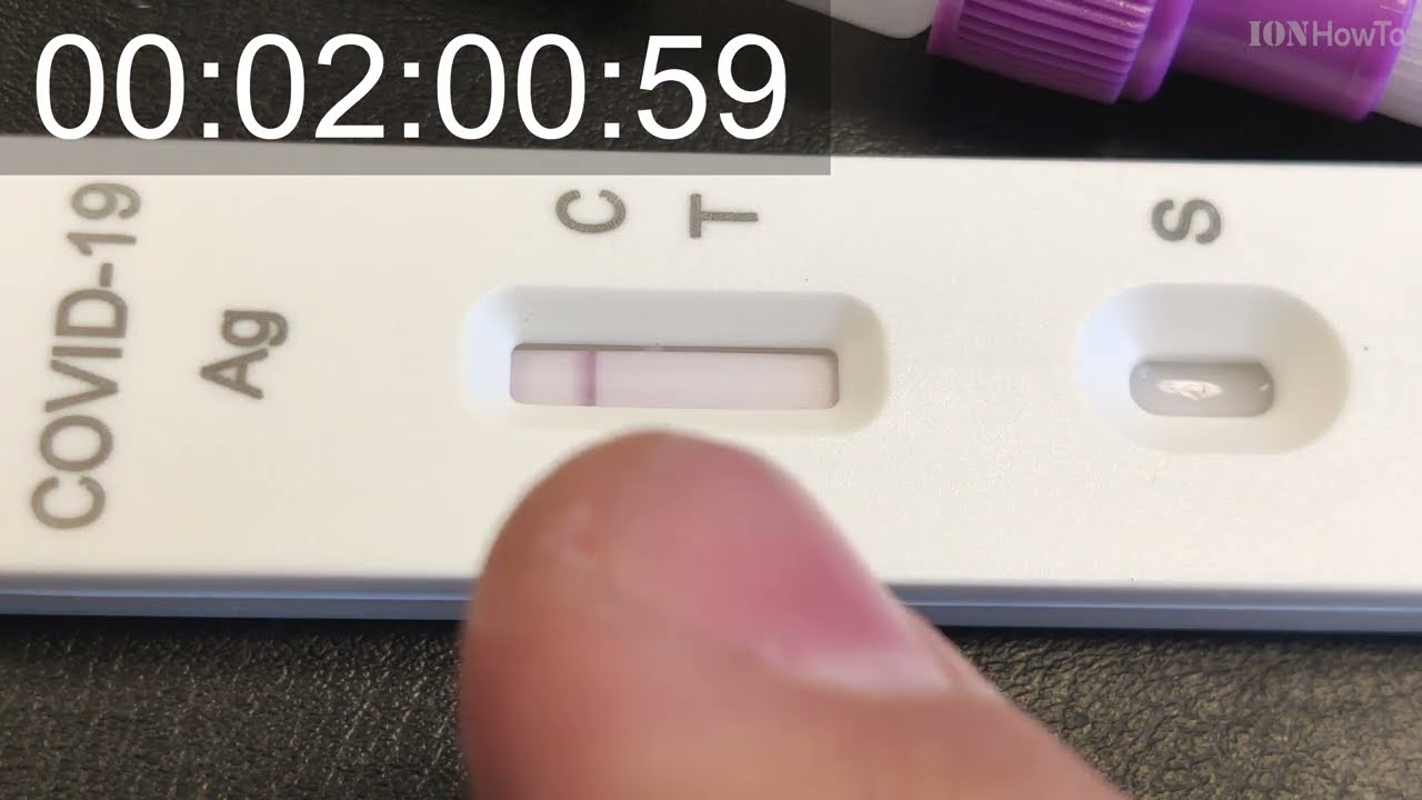 Covid-19 rapid test shows faint positive result after 10 minutes - YouTube
