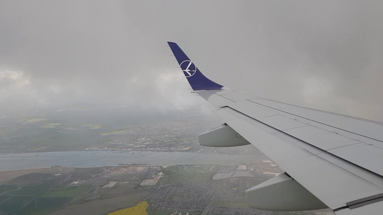 Approach and landing at London City Airport - YouTube