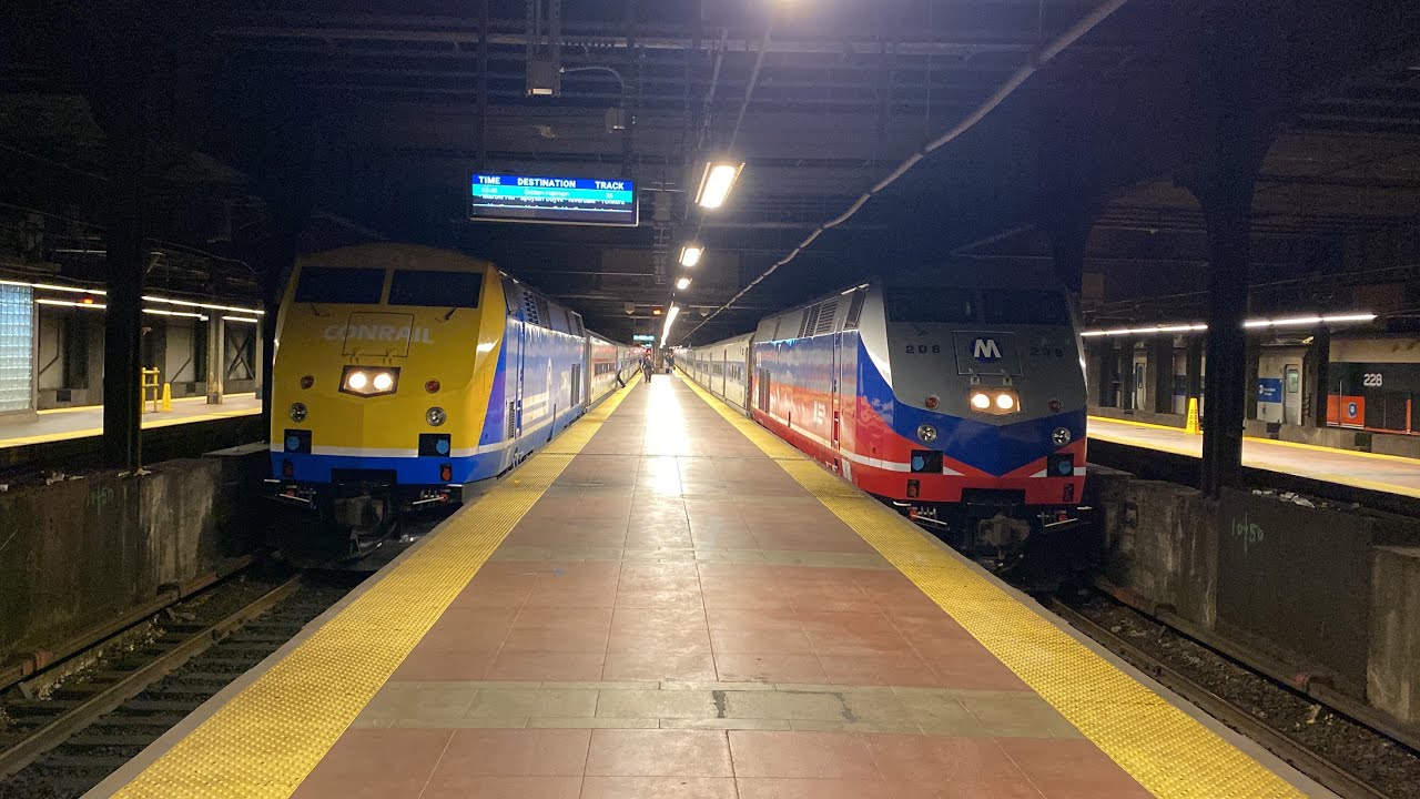 Metro north 40th anniversary P32ACDM No. 201 and 208 leaving GCT - YouTube