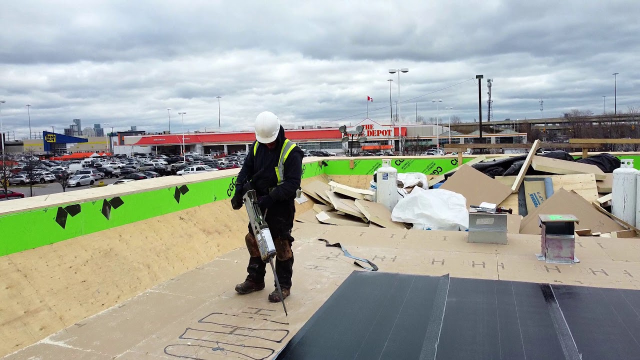 Installation of Soprema Duotack Adhesive for 2-1 SopraSmart Board ...