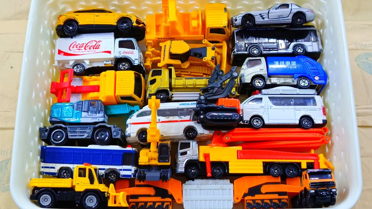 Diecast Model Cars Moving Up To The Box. Little cars go up the ramp ...