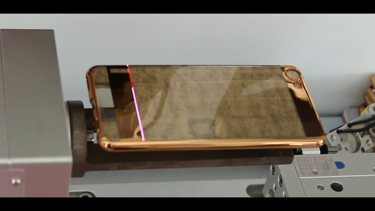 Phone paint peeling by laser. - YouTube