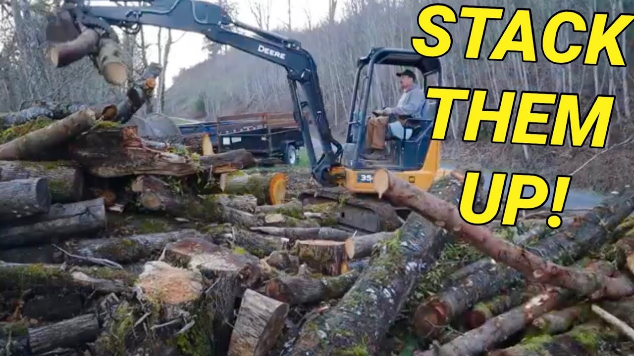 Stacking free firewood logs to make room for more! :) - YouTube