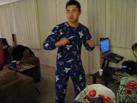 Man dancing in Onesie at Christmas Party to \