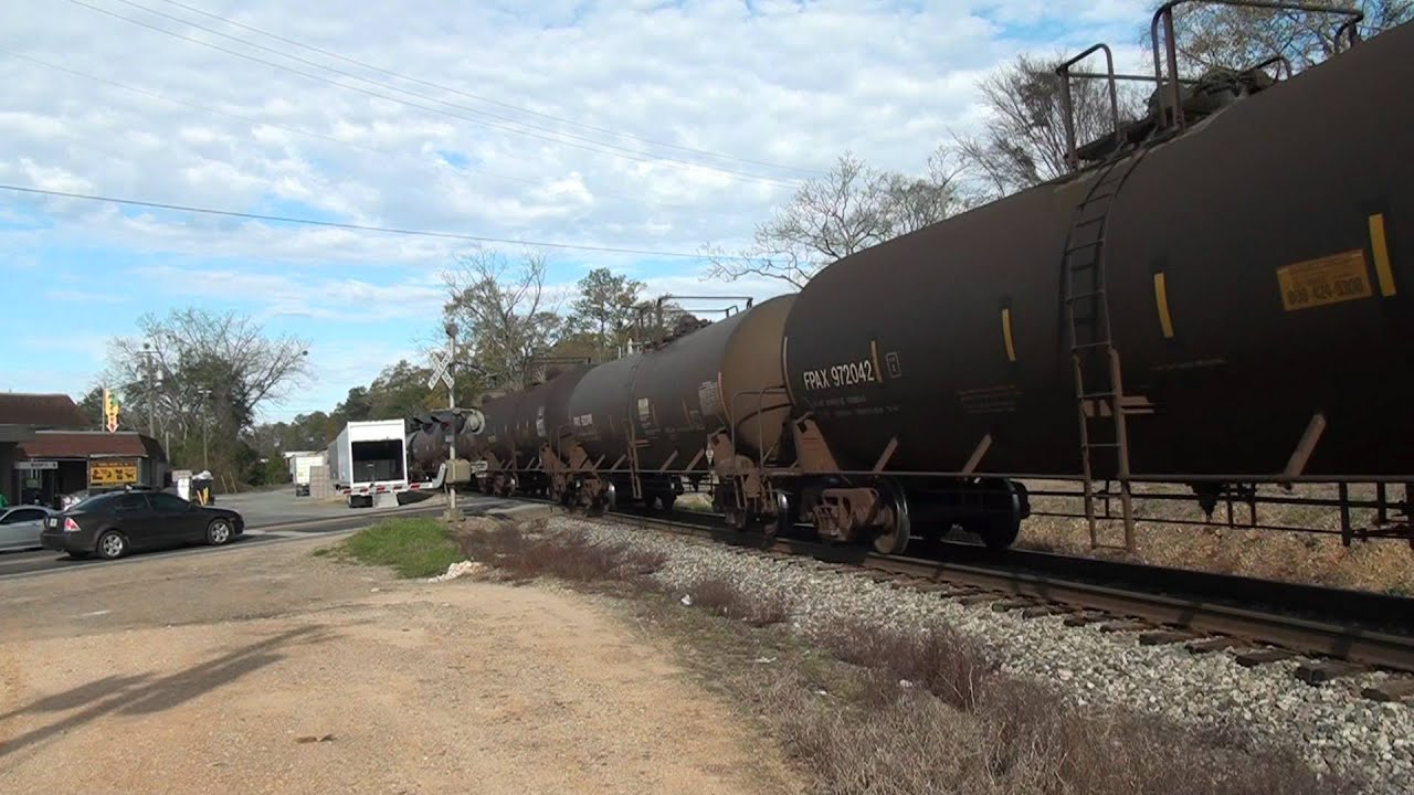 RARE! CSX Q602 heads west with KCS gray ghost power in Marianna Florida ...